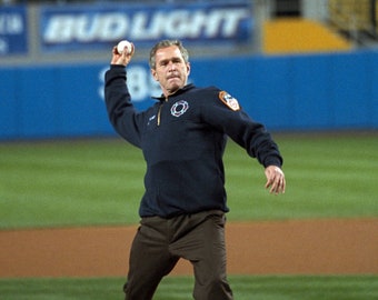 President George W. Bush Throws Out the First Pitch During the 2001 ...