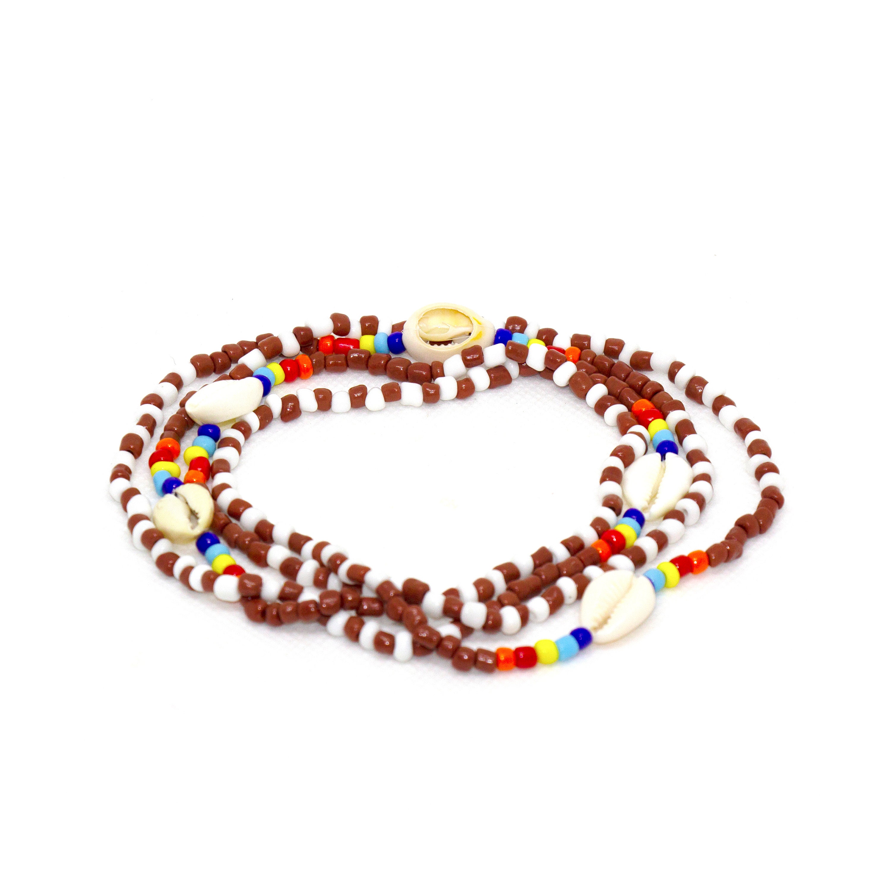 Agayu Eleke with Cowrie Shells