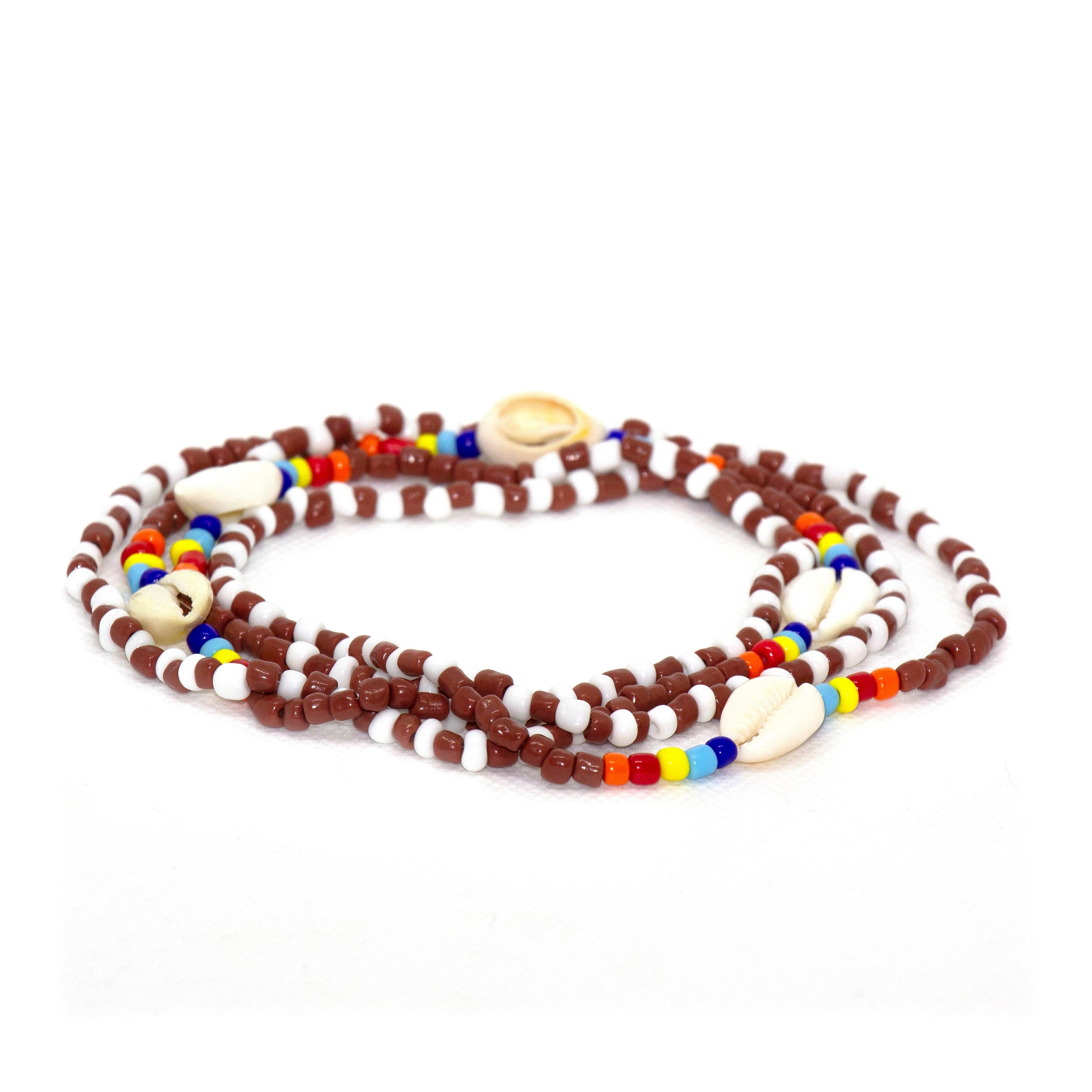 Agayu Eleke with Cowrie Shells