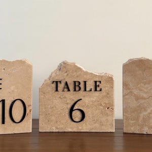 Beige Travertine Wedding Table Numbers: Chiseled Custom Stone, Black ...