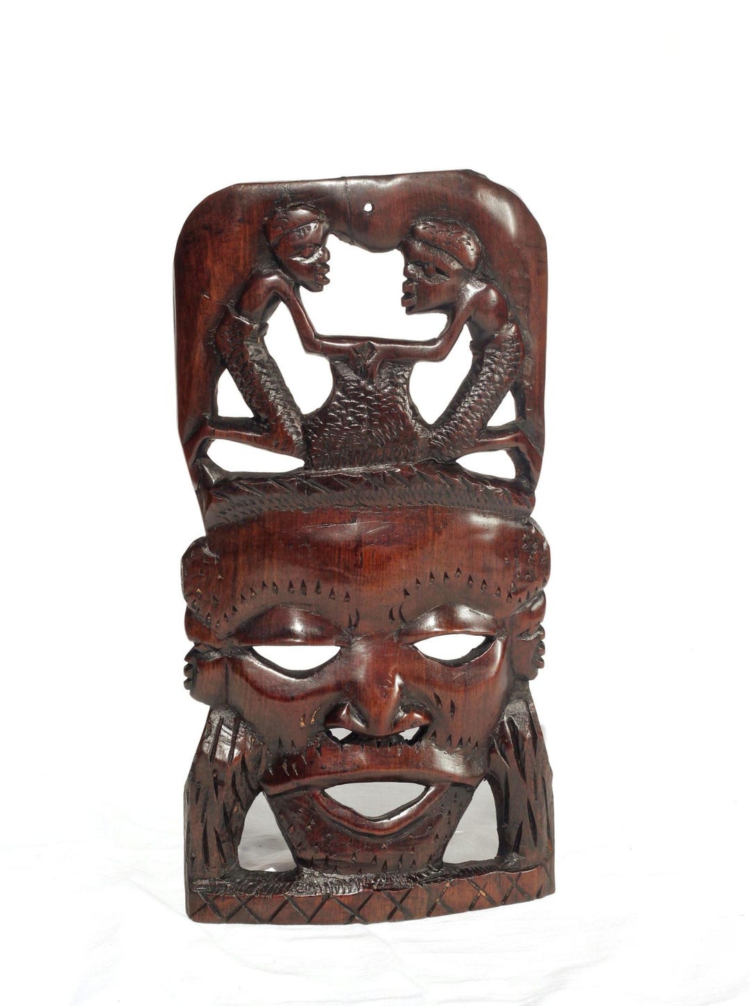 African Man Face Self Standing Mask With Villagers Performing Chores ...