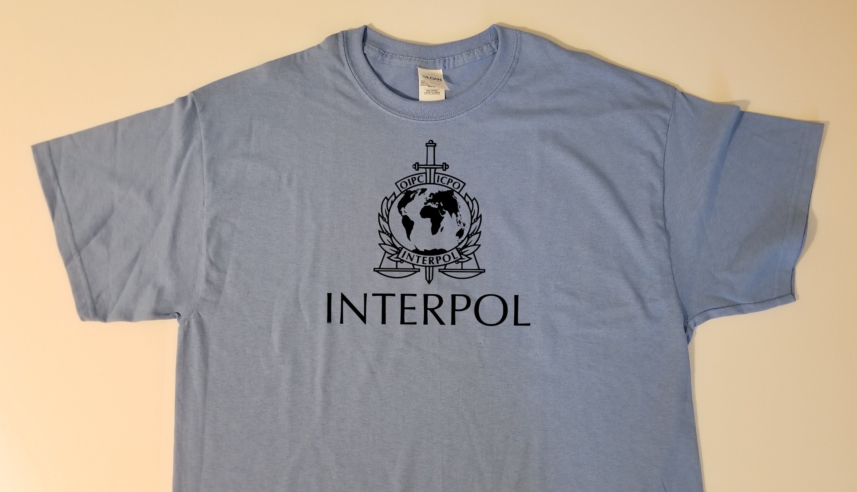Interpol International Criminal Police Organization T-shirt | Etsy