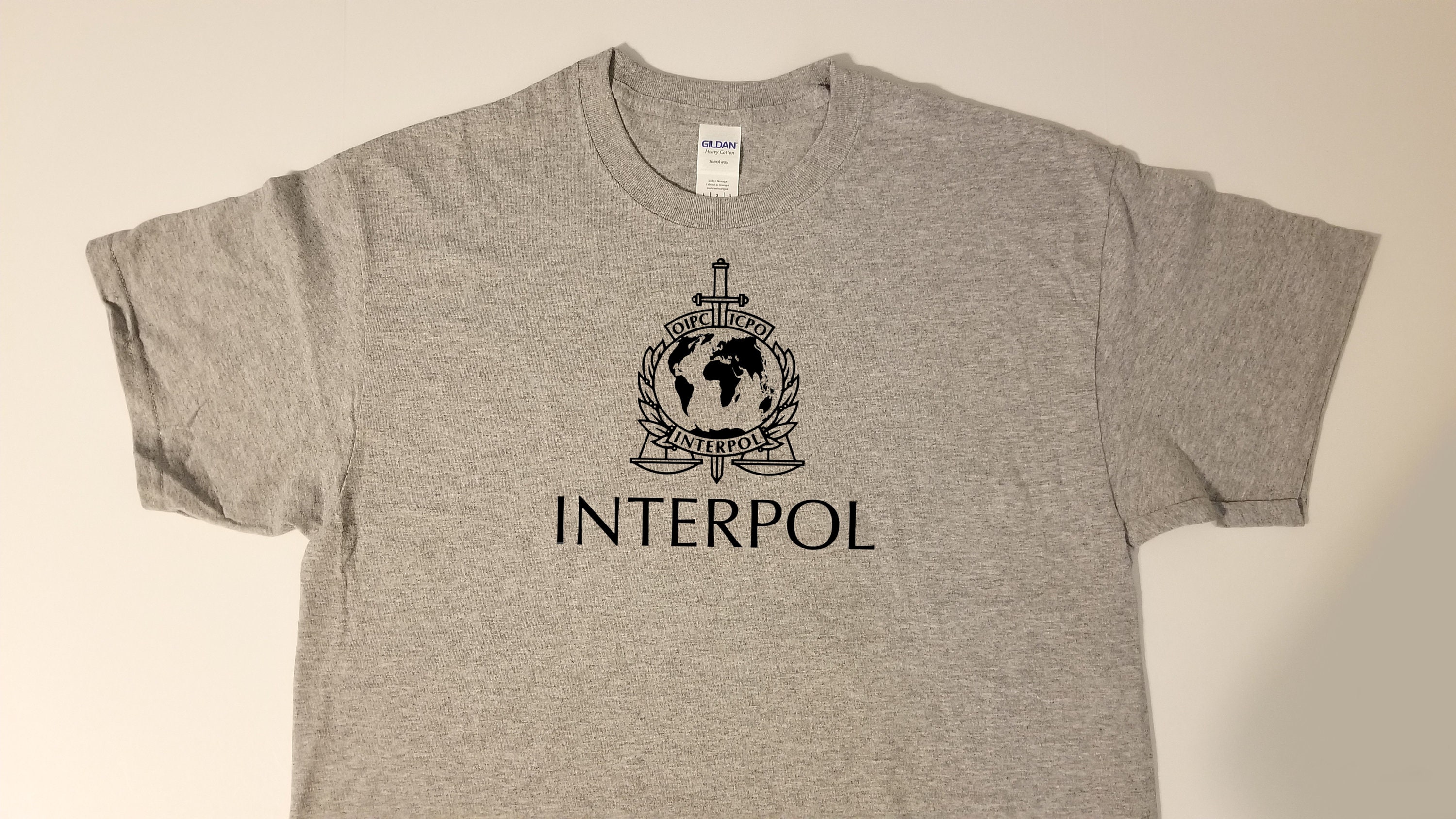 Interpol International Criminal Police Organization T-shirt - Etsy UK
