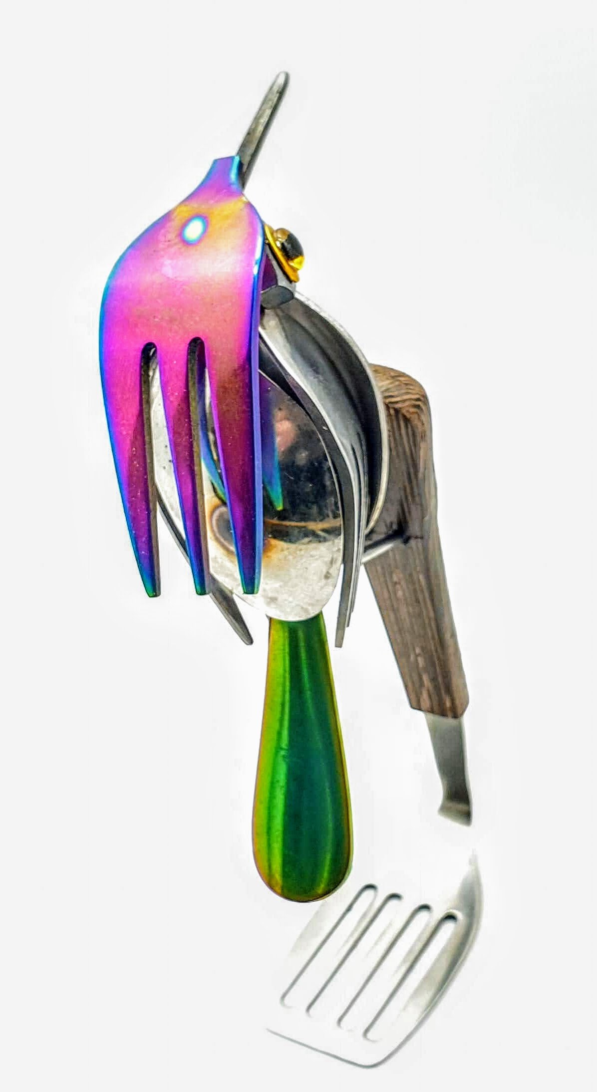 Lovely cutlery finch bird perched on a vintage hand tool and gears base ...