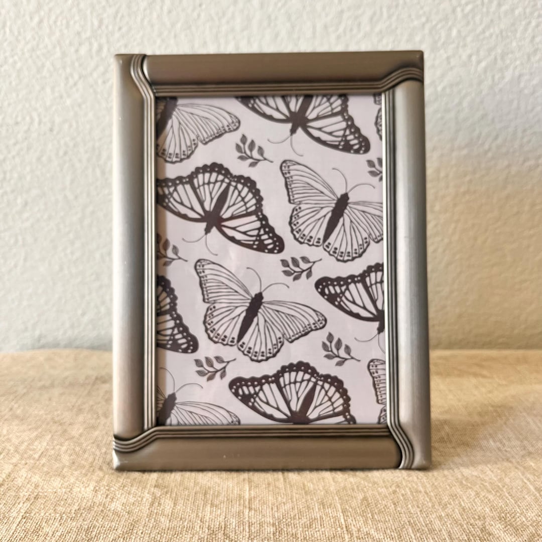 Vintage 8 1/4" X 6 1/4" Silver Frame With Ornate Details Holds a 6 1/2 ...