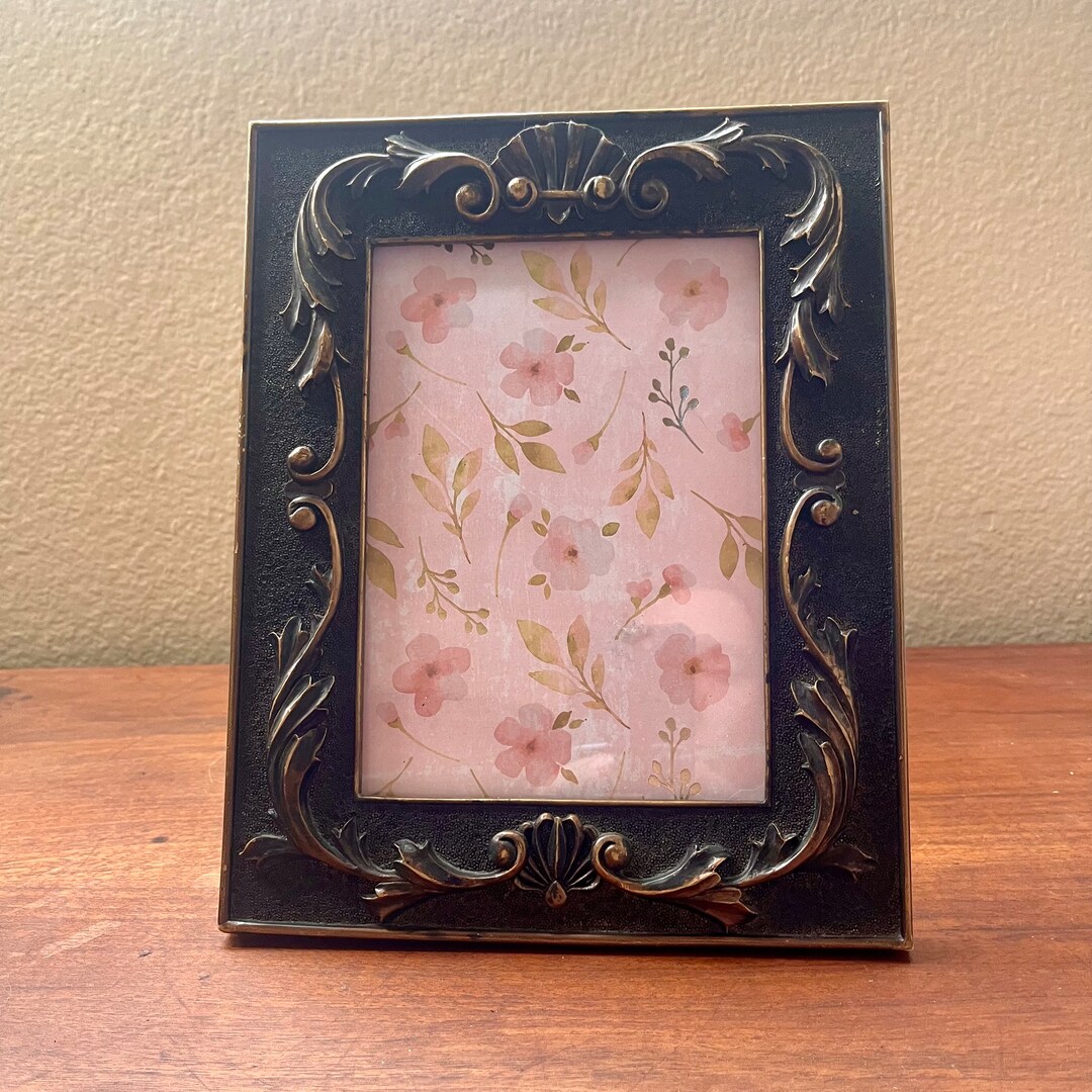 Vintage Bronze Colored Wood Frame With Ornate Detail Holds a 5x7 ...