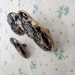 Vintage Small Brass and White Metal Yum Yum Openwork Picture Buttons ...