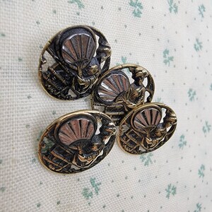 Vintage Small Brass and White Metal Yum Yum Openwork Picture Buttons ...