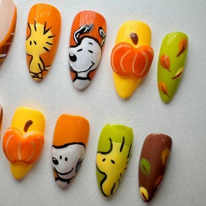 Fall-inspired Press-on Nails, Cute Pumpkins and Adorable Snoopy Nail ...
