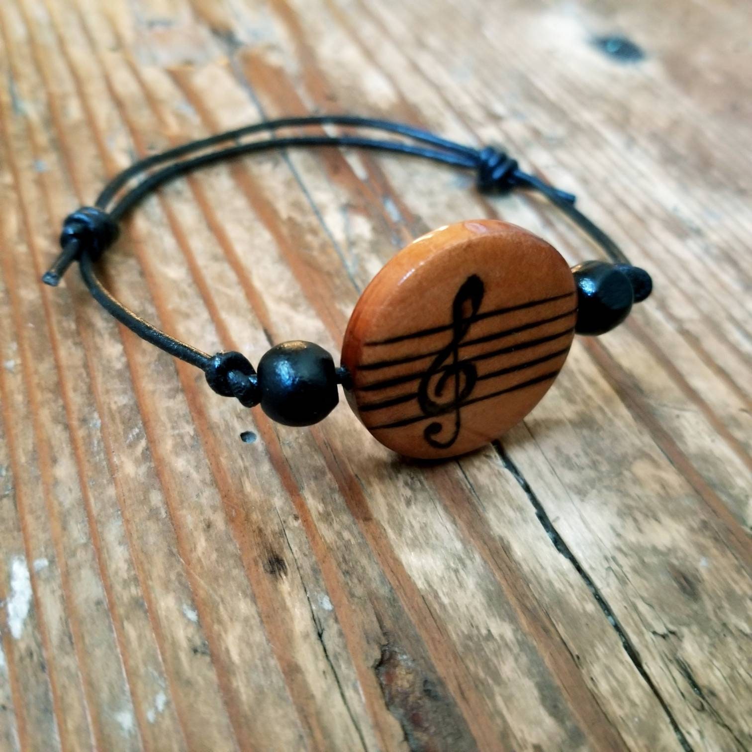 Handburned Music note wooden bead boho/hippie bracelet with a | Etsy