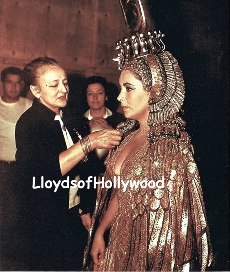 Elizabeth Taylor Wearing Entrance Into Rome Gold Costume With Designer ...