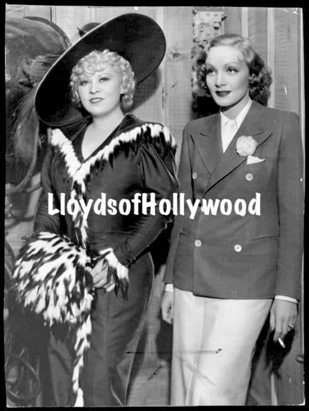 Mae West With Marlene Dietrich Holding a Cigarette Dressed Masculine ...
