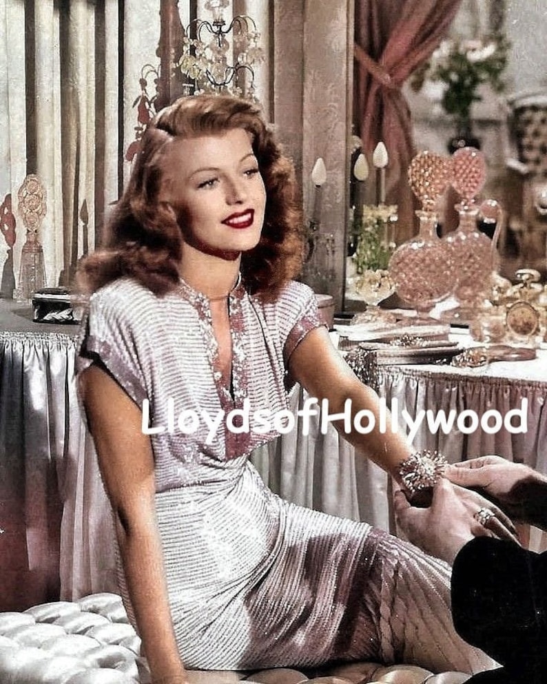 Rita Hayworth Plays Gilda Wearing Jean Louis Dress and Jewelry at Her ...