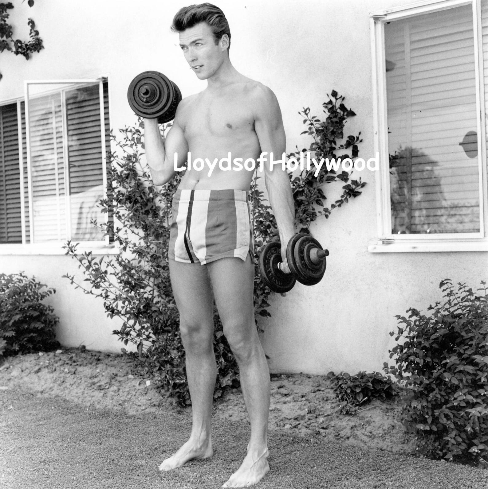 Clint Eastwood Handsome Actor Director Lifting Hand Weights Athletic ...