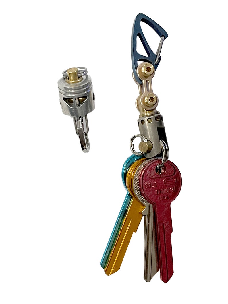 KYLINK Rotating Skull Piston Bob Keychain With Clip & Ring - Etsy