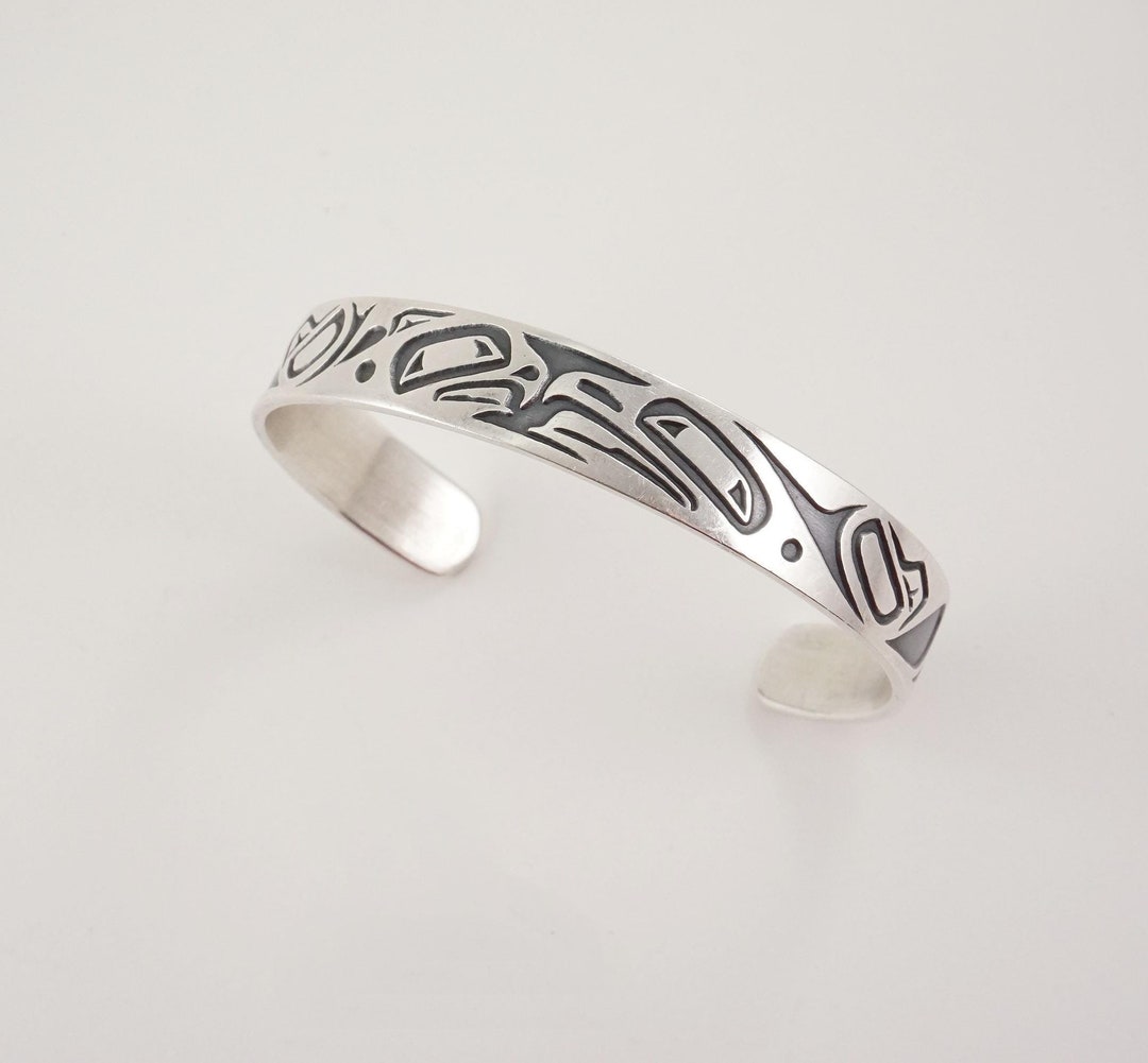 D. Dennis Sterling Eagle and Raven Cuff Bracelet, Haida, Tlingit, Pacific Northwest, Northwest ...