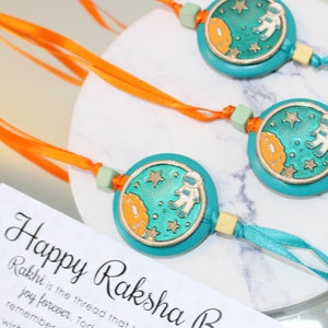 Spaceman Circular Rakhi | Presented on a Luxury Backing Board With ...