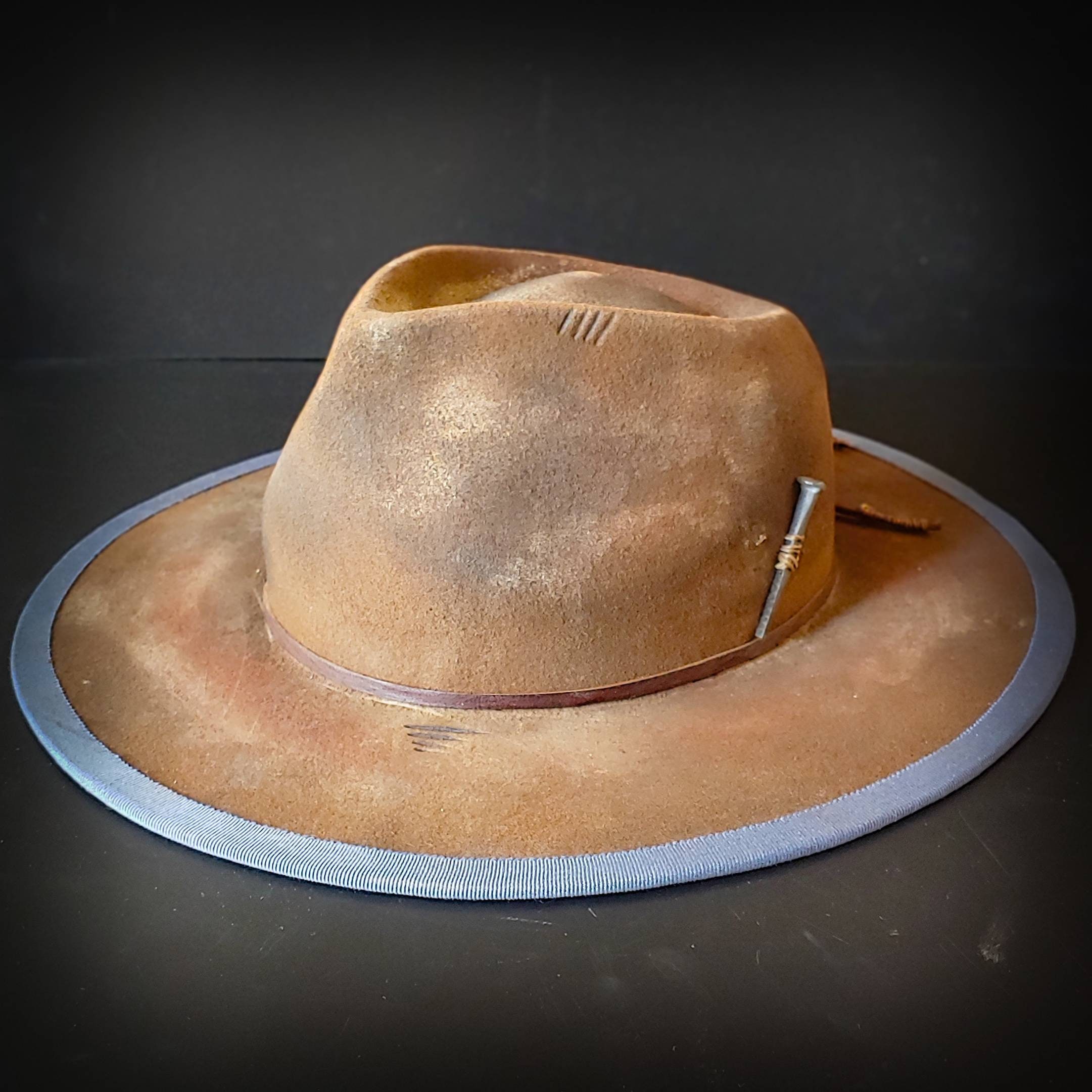 Cowboy hat size 7 3/8. The Downtrodden Delinquent from Ugly Outlaw.