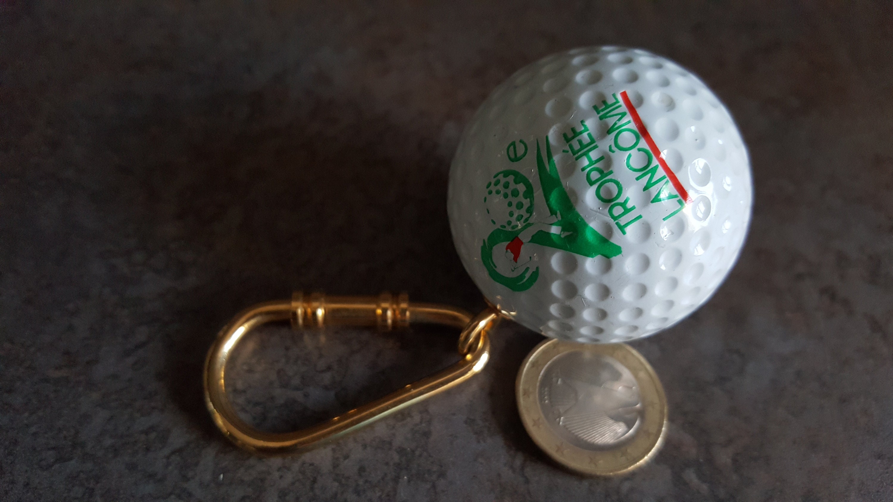 Llavero de pelota de golf publicidad Trofeo perfume francés Lancôme ...
