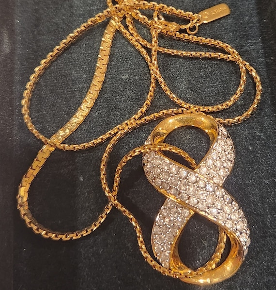 Vintage Monet Gold Tone Necklace with Sparkling Infin… - Gem