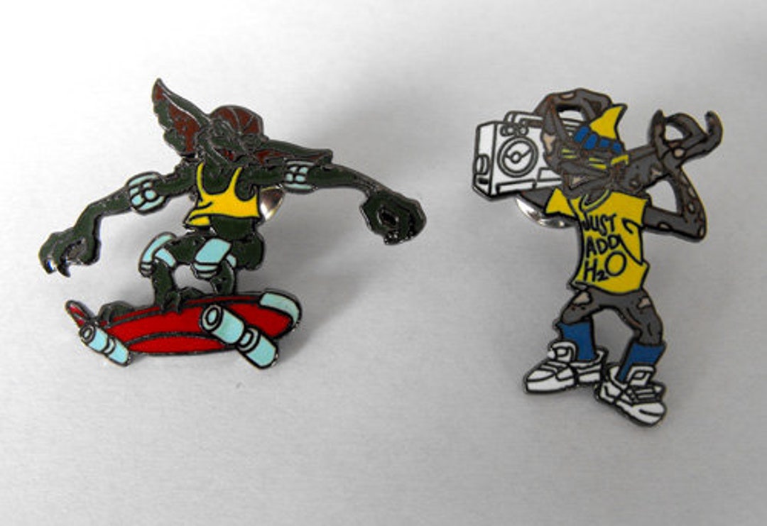 GREMLINS Stripe 2 X Pin One With Radio One Standing on Skateboard Dated ...