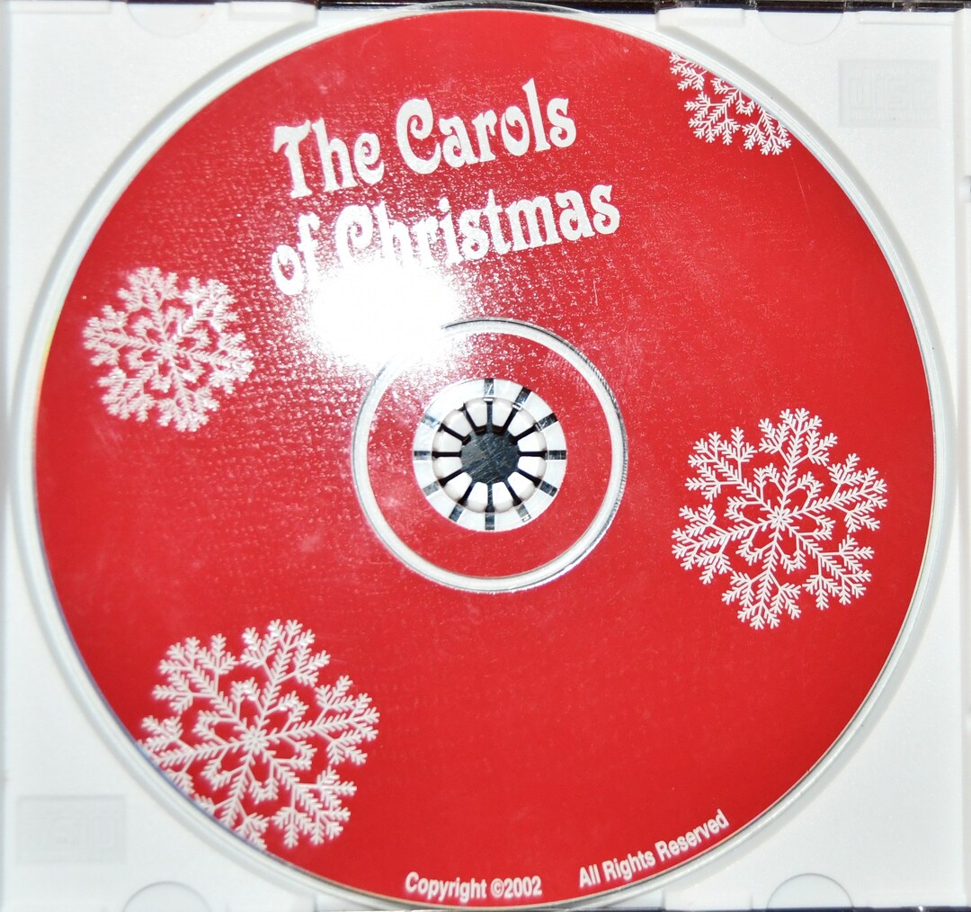 The Carols of Christmas - 2002 / Cover is Disjointed and It Has No ...