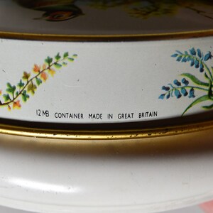 Vintage Riley's Toffee Tin - Graphic of Two Peasants / Embossed Round ...