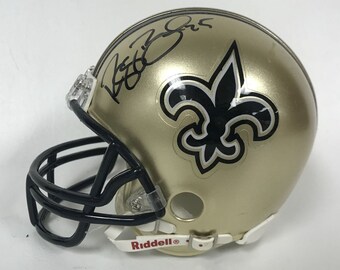 Reggie Bush signed mini helmet - munimoro.gob.pe