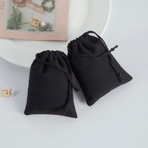 50pcs Black Cotton Pouch Drawstring Bags Jewelry Package Bag Gift Favor ...