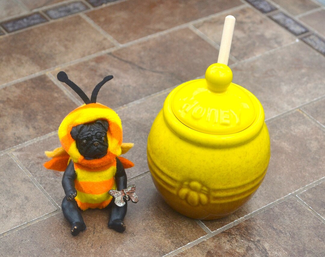 A Bumblebee Pug Doll Accompanied by a Honey Pot, Perfect for Adorning a ...