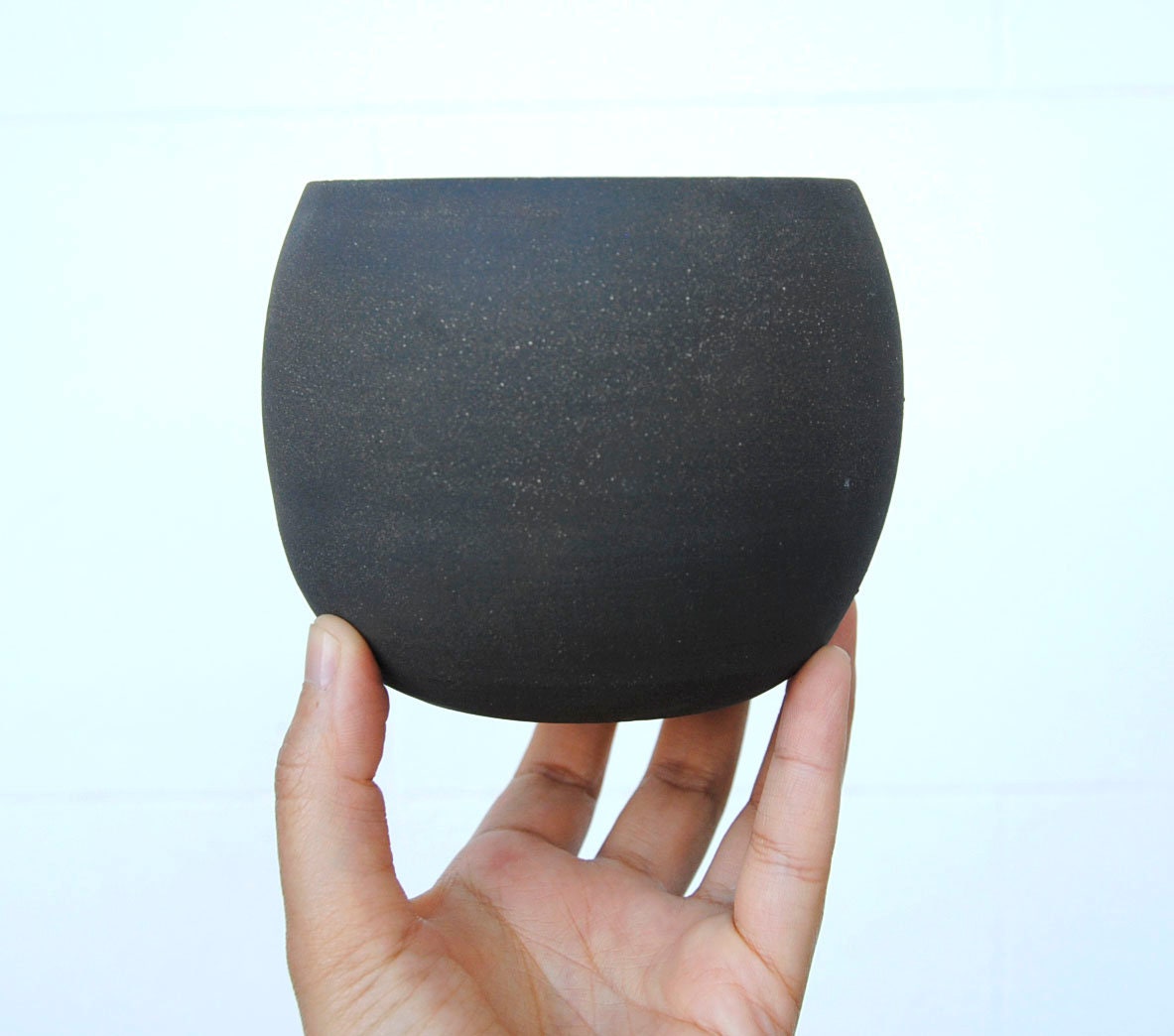 Black clay pot with natural texture. Perfect shape for a plant hanger ...