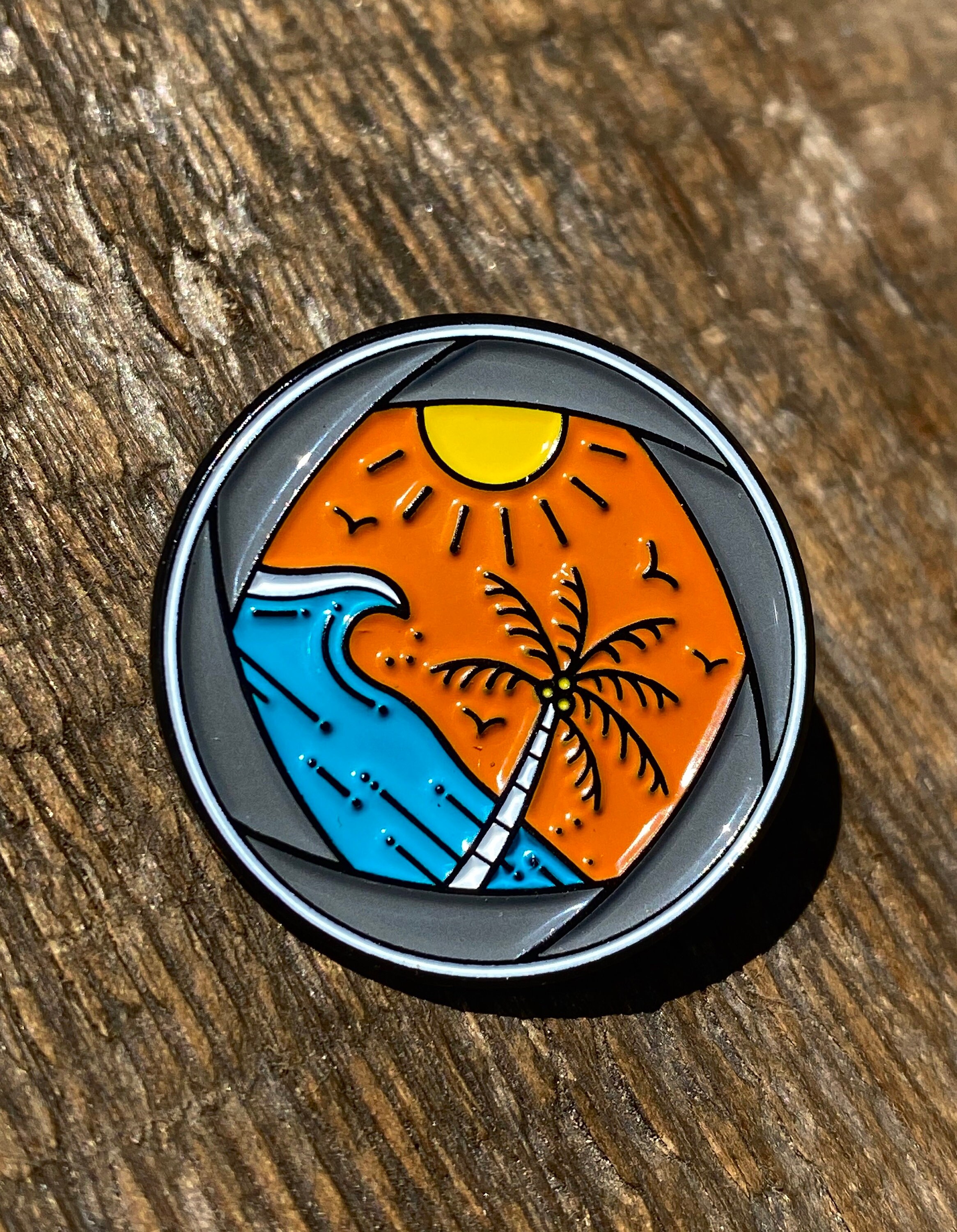 Aperture Beach Sunset Enamel Pin Badge, in a Fresh New Collectable Neon Colour Ready for Summer ...
