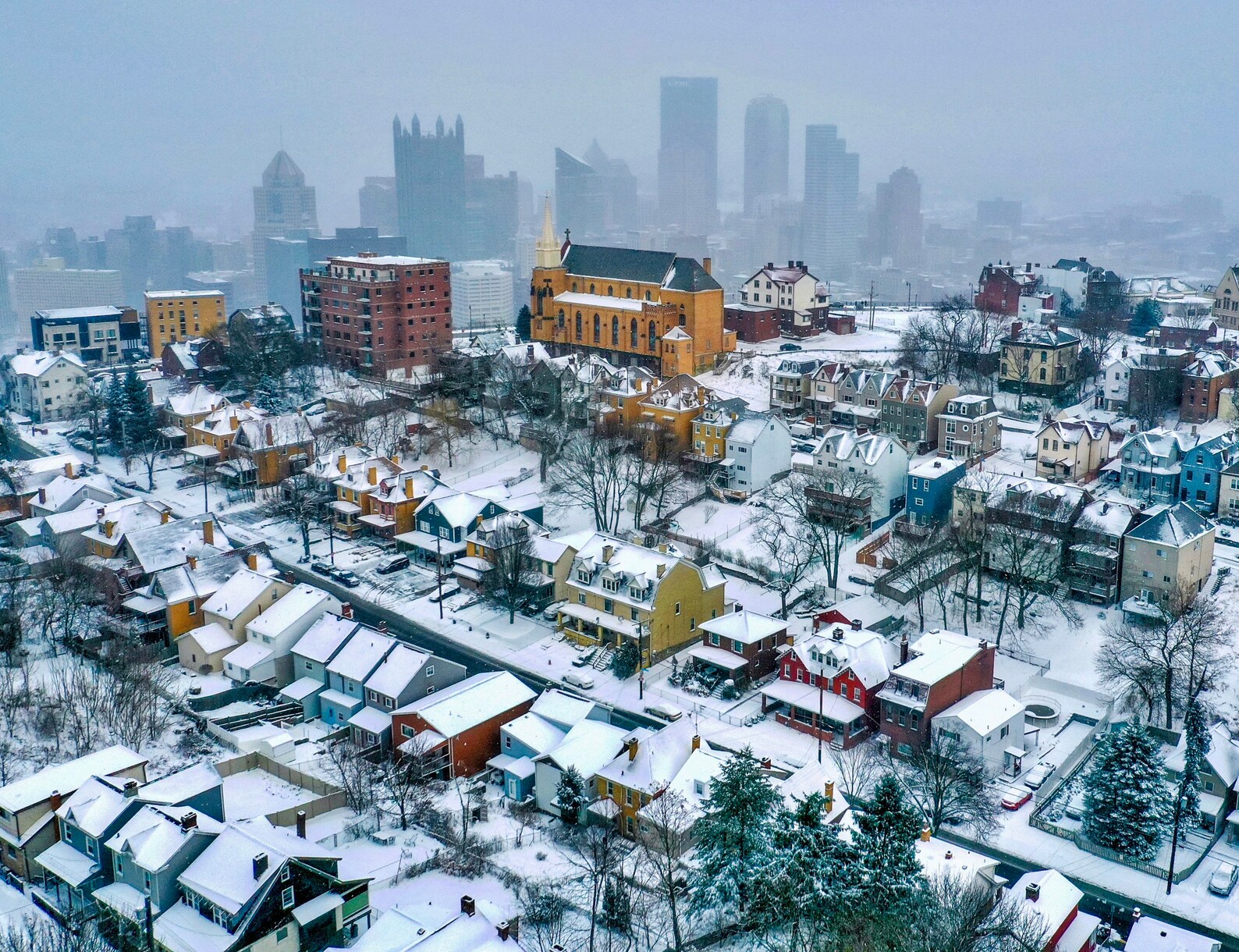 Snow Covered Homes of Mount Washington With the Pittsburgh Skyline in ...