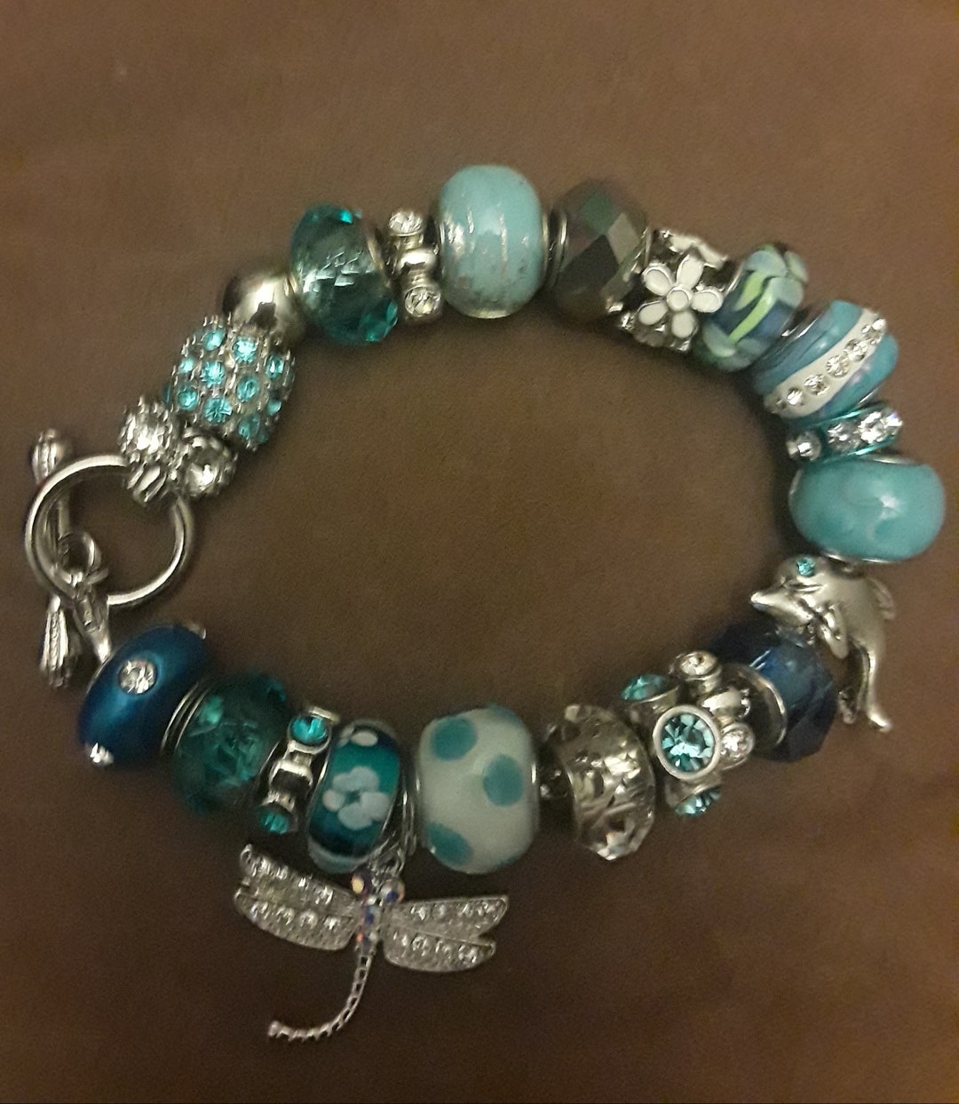 Blue Pandora Charm Bracelets With Firefly, Dolphin, Angel and Heart ...