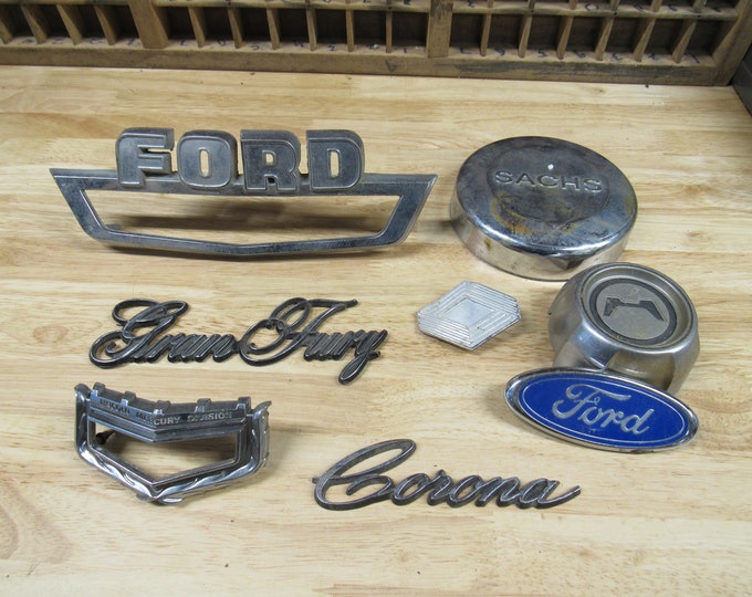 Assorted Car Emblems, Ford, Corona, Grand Fury, Mercury, Honda, Sachs ...