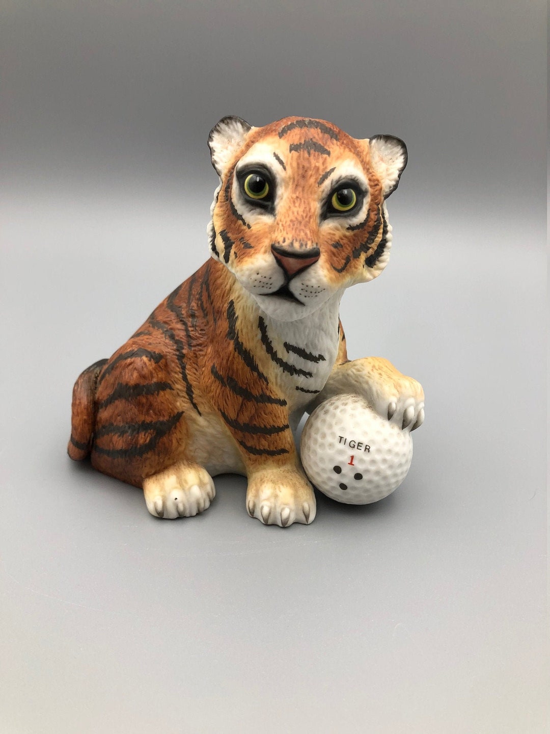 Tiger Woods Porcelain Sculpture by Boehm Fine Art & Tiger Woods' Plate ...