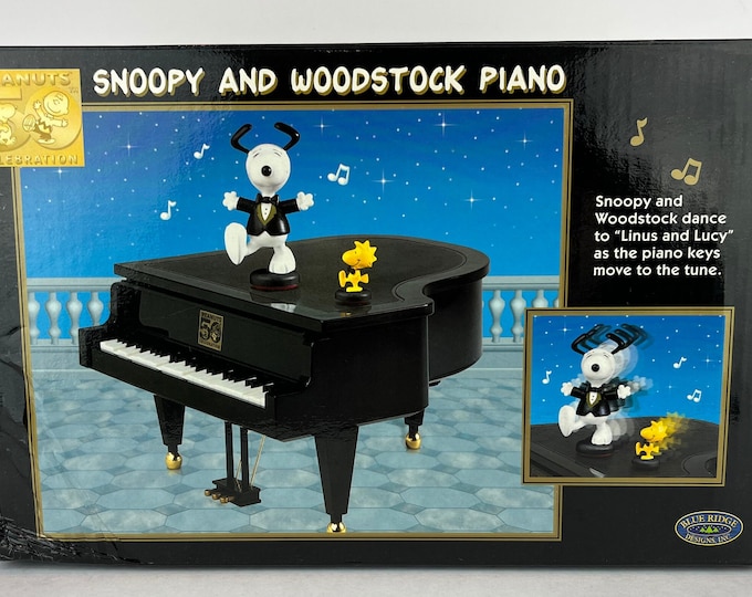 Peanuts 50th Anniversary Celebration Snoopy and Woodstock Electric ...