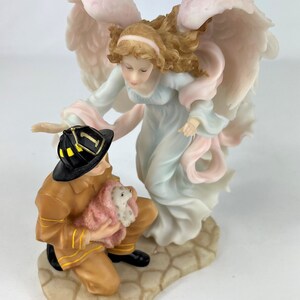 Seraphim Classics Caring Touch Angel With Fireman Heaven on Earth ...