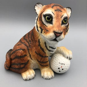 Tiger Woods Porcelain Sculpture by Boehm Fine Art & Tiger Woods' Plate ...