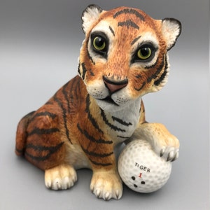 Tiger Woods Porcelain Sculpture by Boehm Fine Art & Tiger Woods' Plate ...