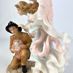 Seraphim Classics Caring Touch Angel With Fireman Heaven on Earth ...