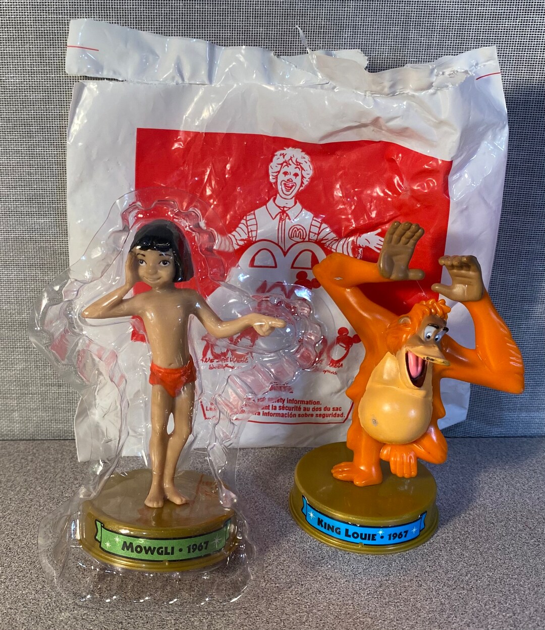 Vintage McDonald Tarzán Happy Meal 100 años de Disney Magic Mowgli y ...