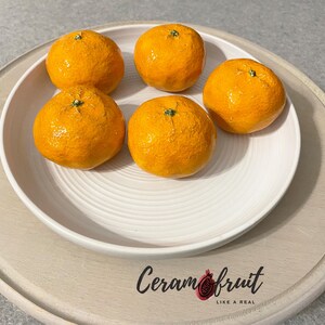 Ceramic Mandarin. Porcelain Figurine Figurine to Decorate Holiday ...