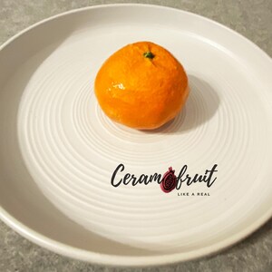 Ceramic Mandarin. Porcelain Figurine Figurine to Decorate Holiday ...