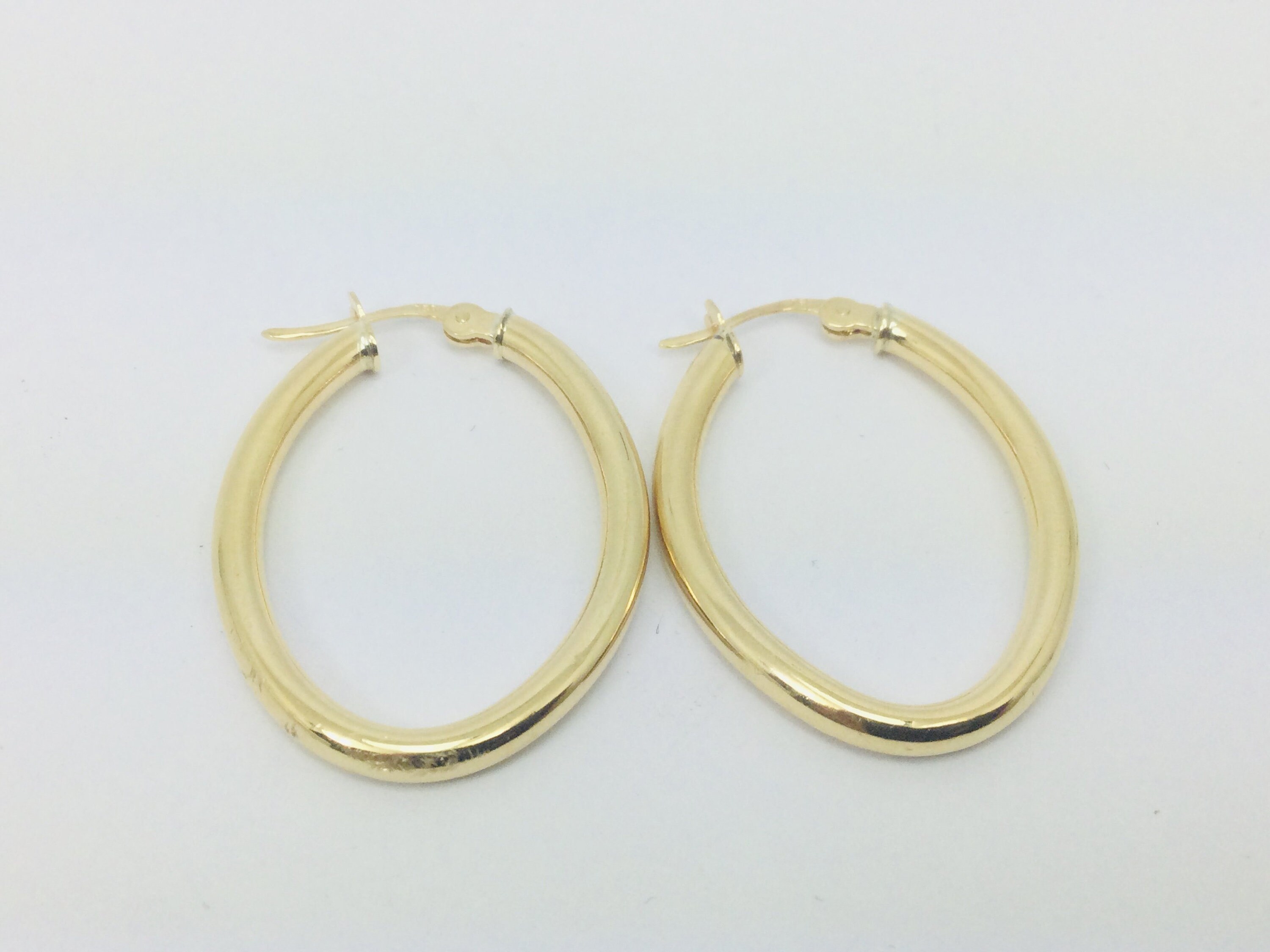 Pendientes de aro ovalado de oro amarillo de 18 k - Etsy España