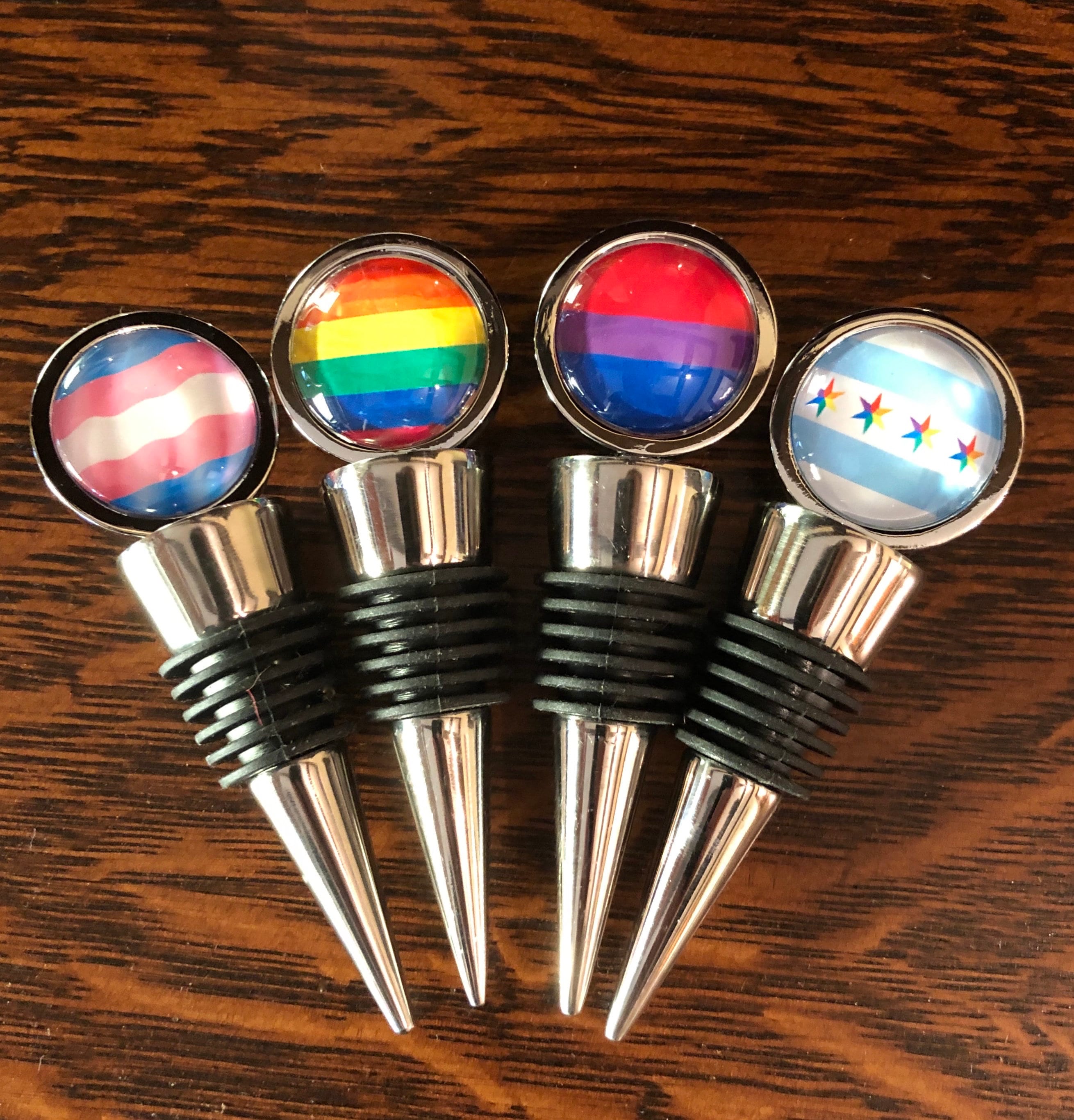 Show your Pride with LGBTQ Pride Flag Wine Stoppers on Stainless Steel ...