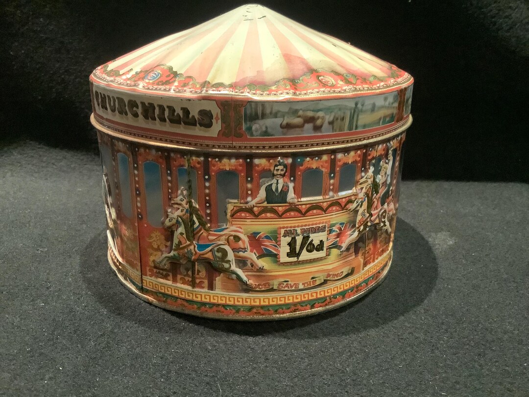 A Vintage Collectible Embossed Churchill's Carousel Cookie Tin, Based ...