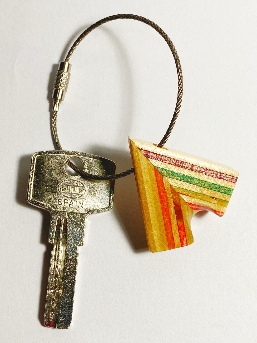 Handmade Keychains Made From Recycled Skateboard Decks, a Thin Layer of ...