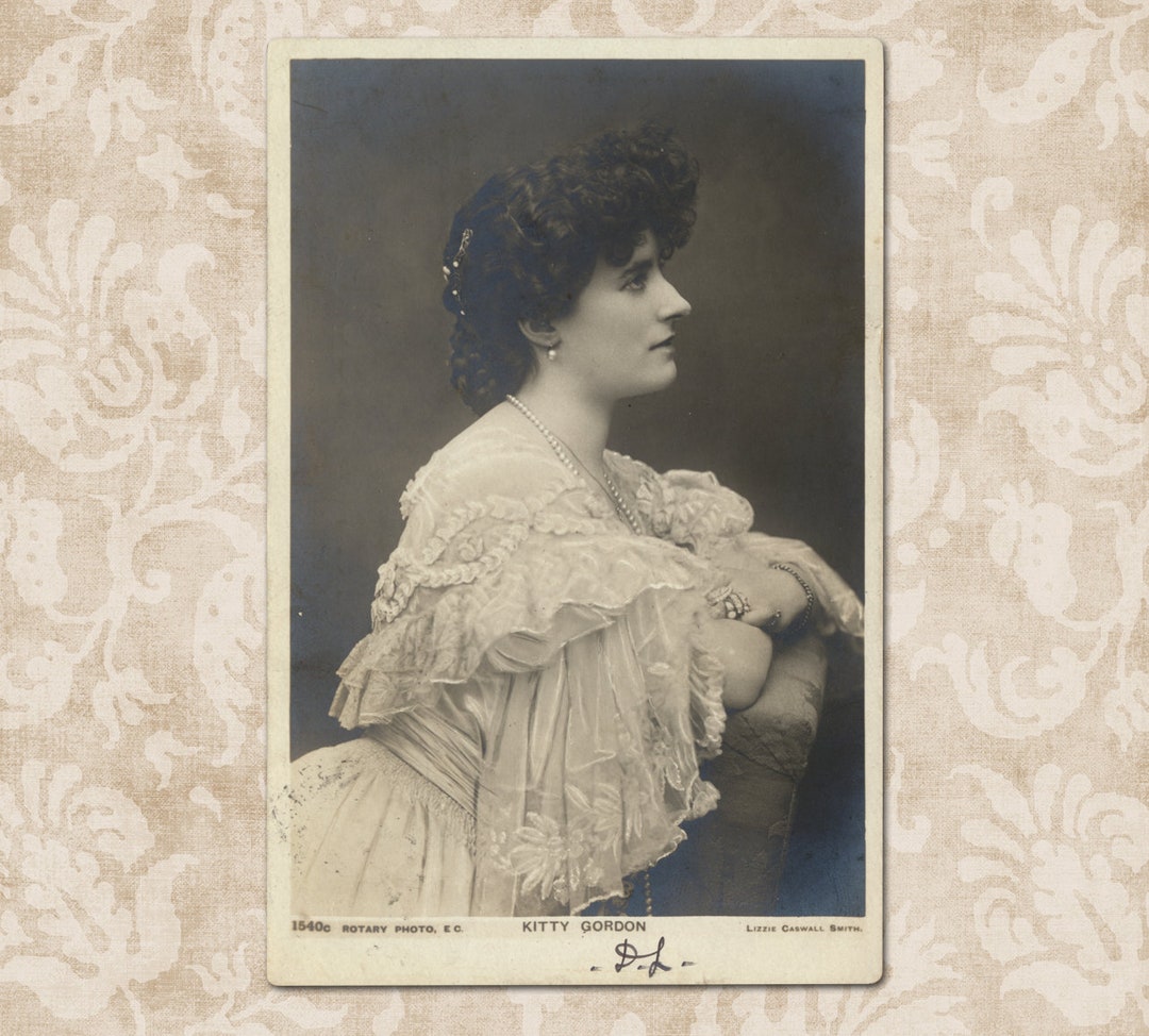 Pensive Actress Kitty Gordon in Lace Dress With Lots of Jewelery ...