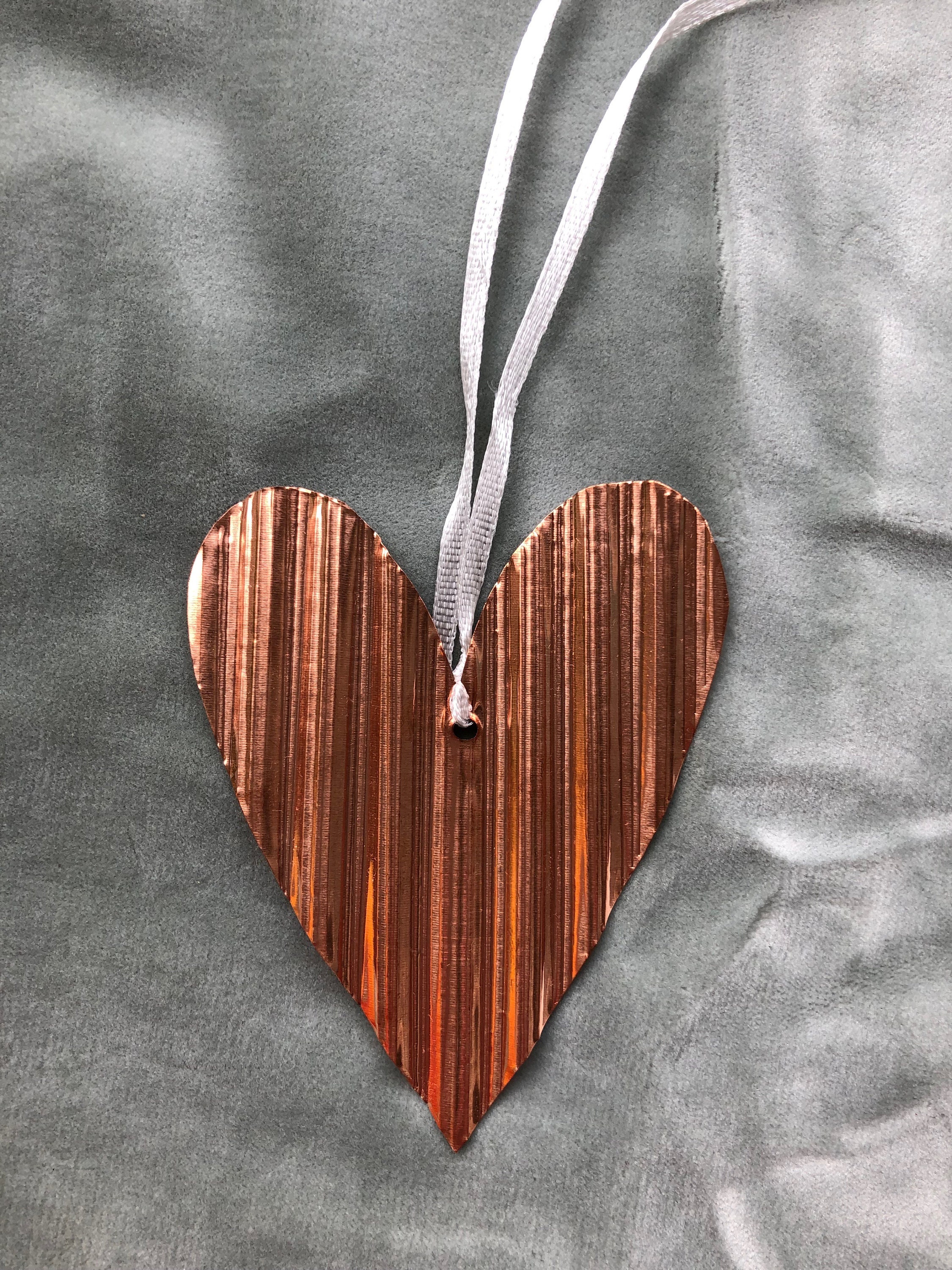Hand embossed hanging copper heart | Etsy